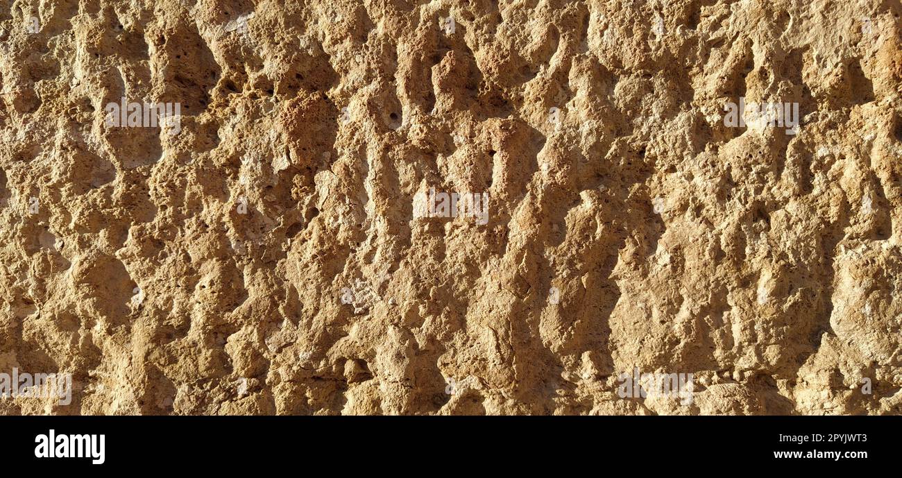 Beautiful sandstone, compacted sand. Stone texture on an old marble ...