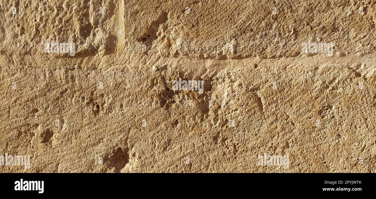 Beautiful sandstone, compacted sand. Stone texture on an old marble ...