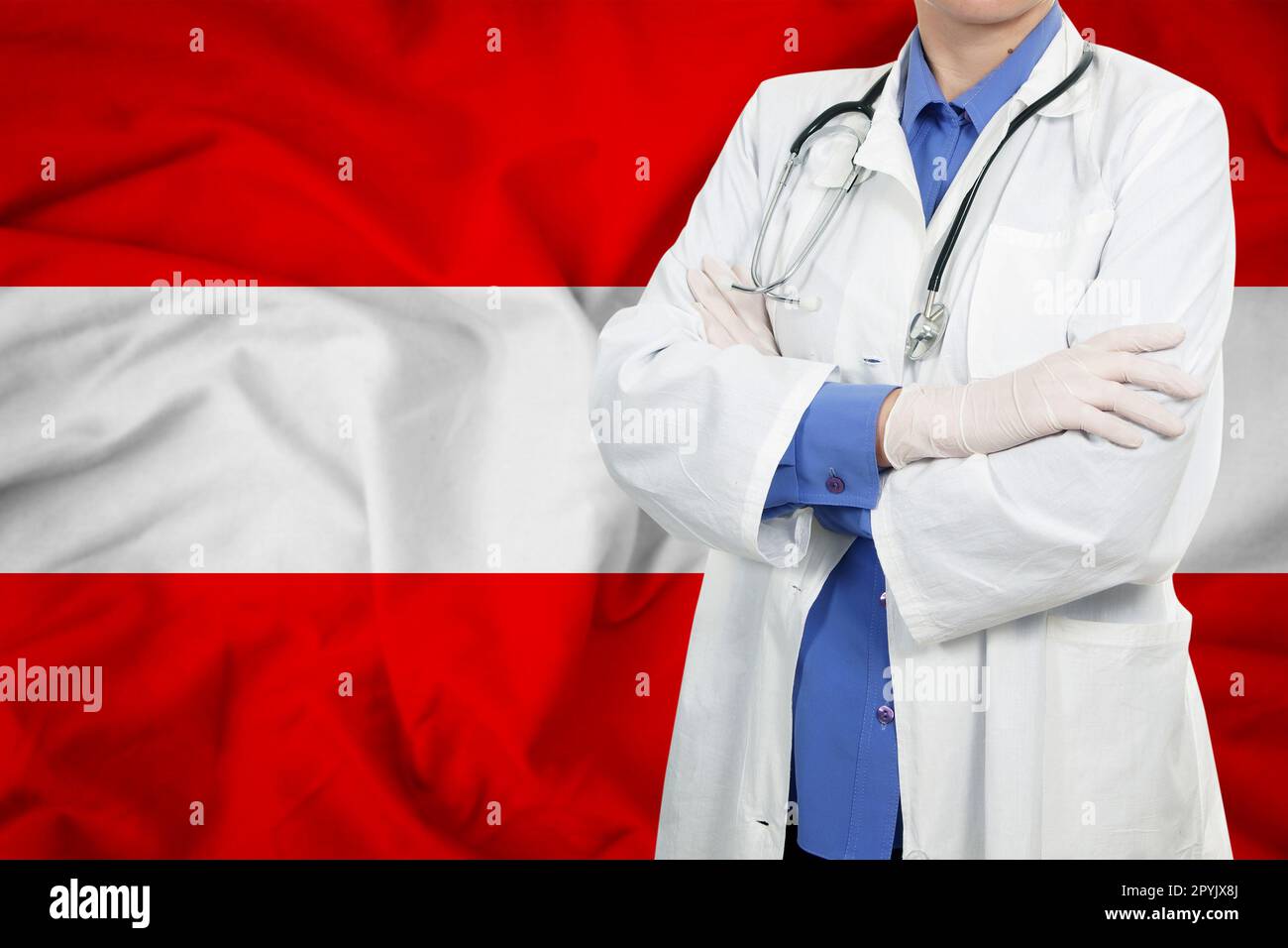 Doctor standing with the flag Stock Photo - Alamy