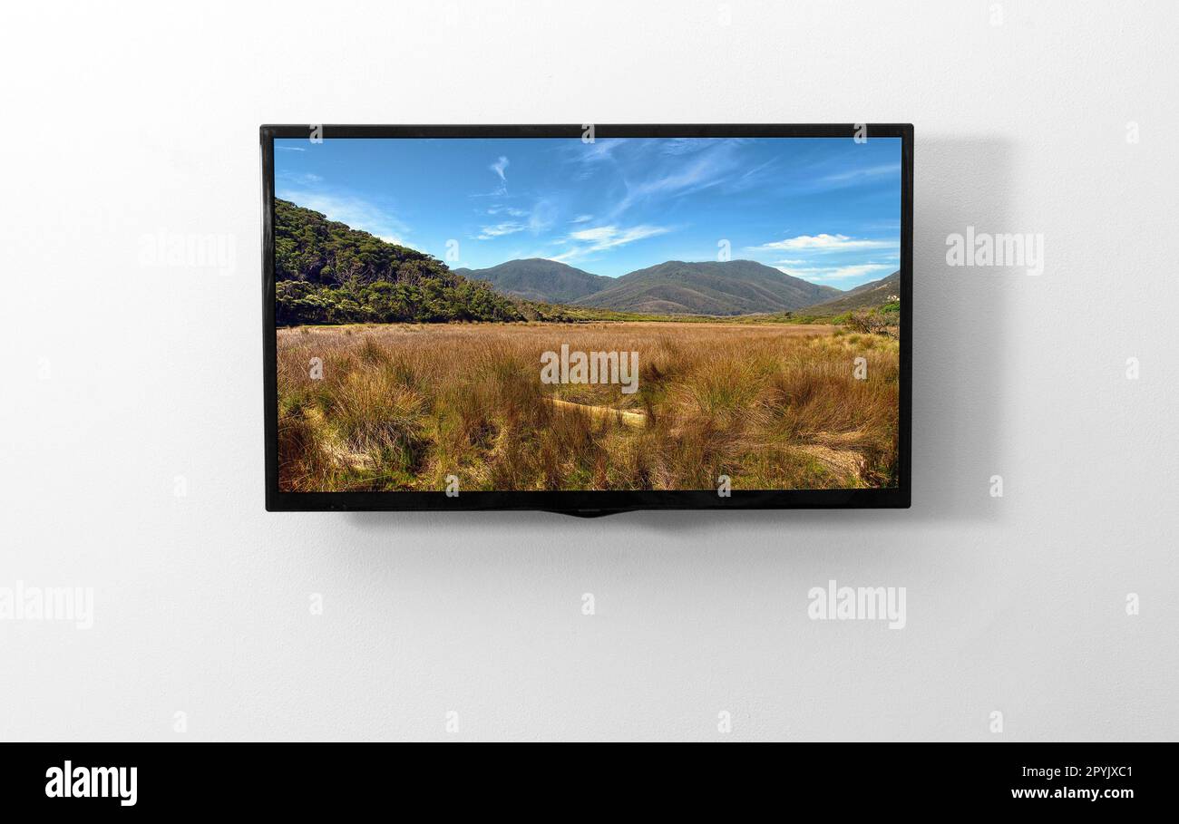 TV monitor on the wall Stock Photo - Alamy