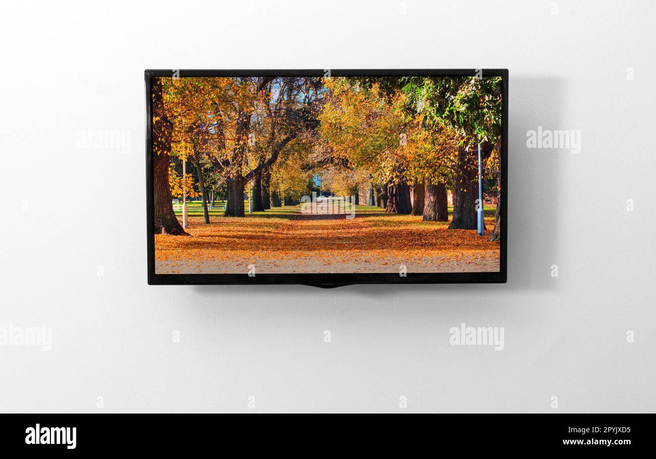 TV monitor on the wall Stock Photo - Alamy
