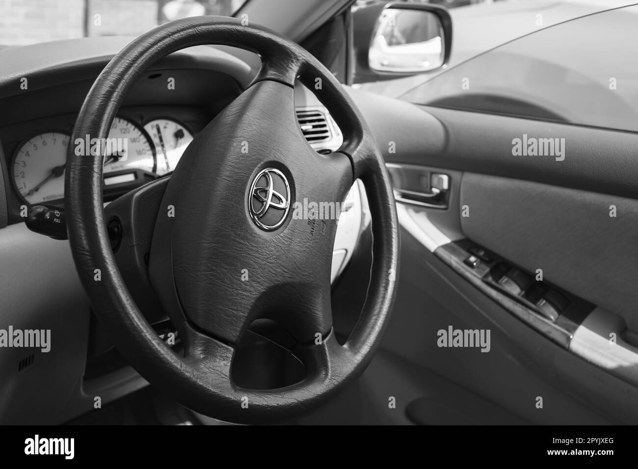 Interior and dashboard of Toyota. Steering wheel and front console ...