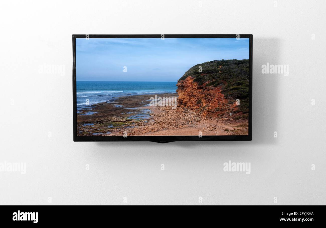TV monitor on the wall Stock Photo - Alamy