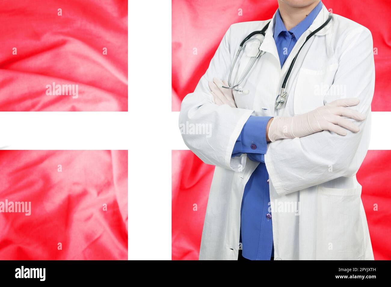 Doctor standing with the flag Stock Photo - Alamy
