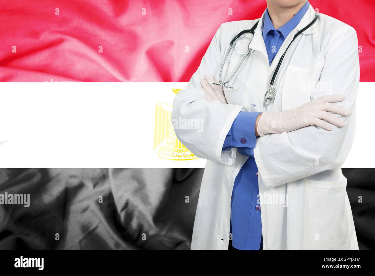 Doctor standing with the flag Stock Photo - Alamy
