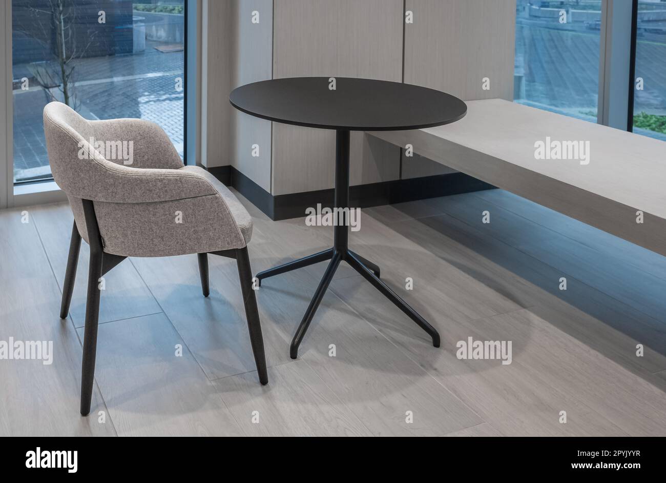 Seating in the foyer of modern office. Modern minimalist desk or ...