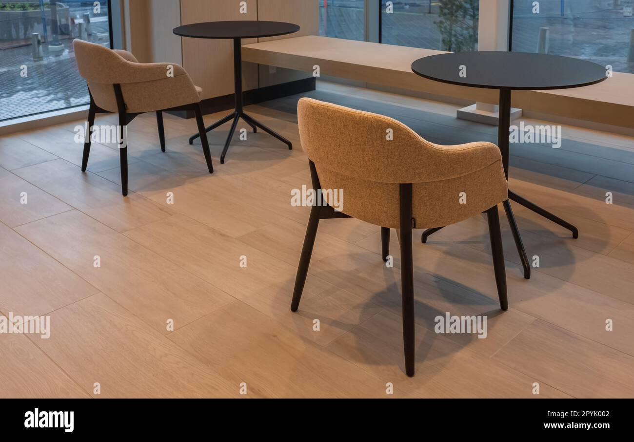 Seating in the foyer of modern office. Modern minimalist desk or ...