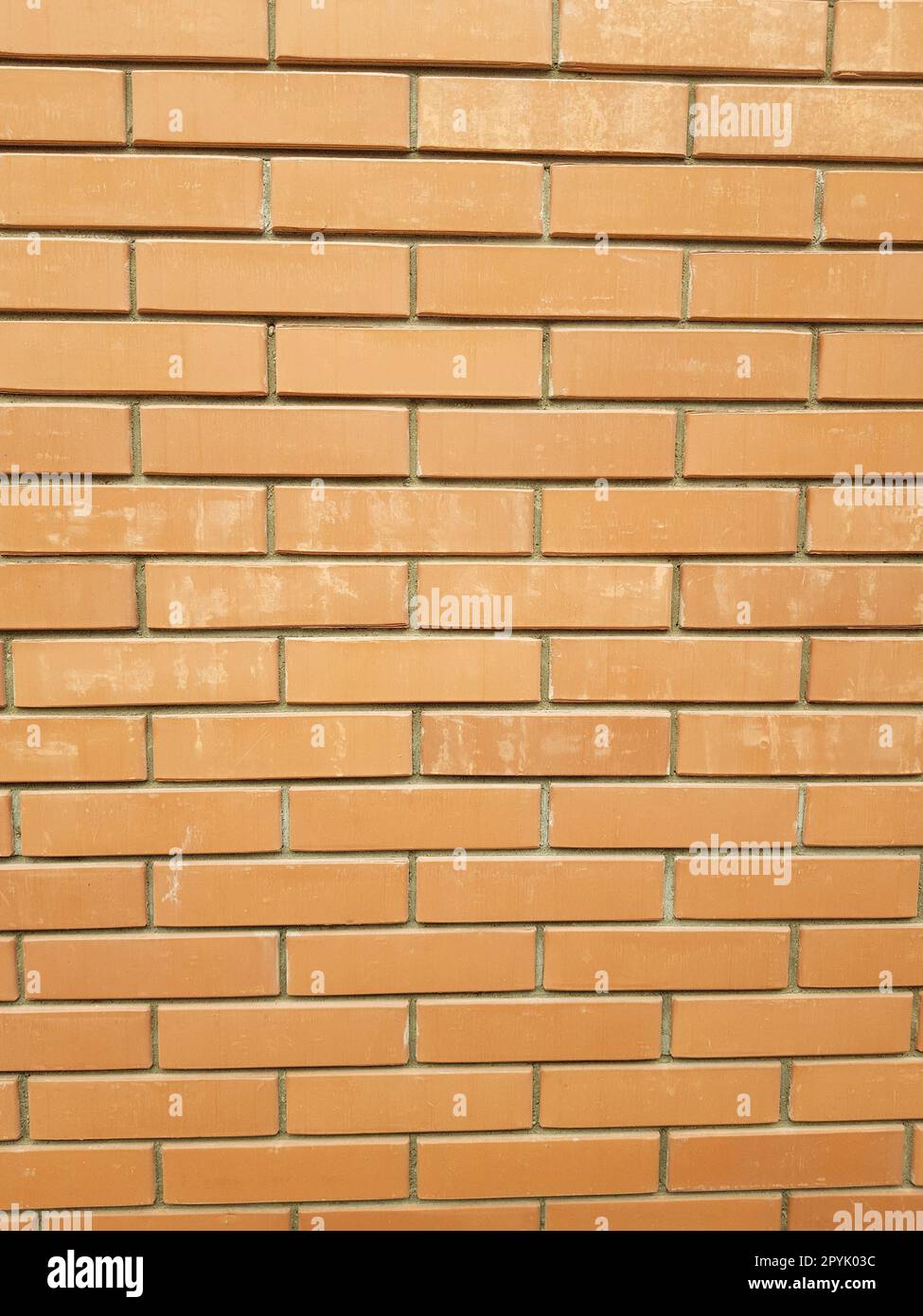 The modern texture of an orange brick wall is the background material ...