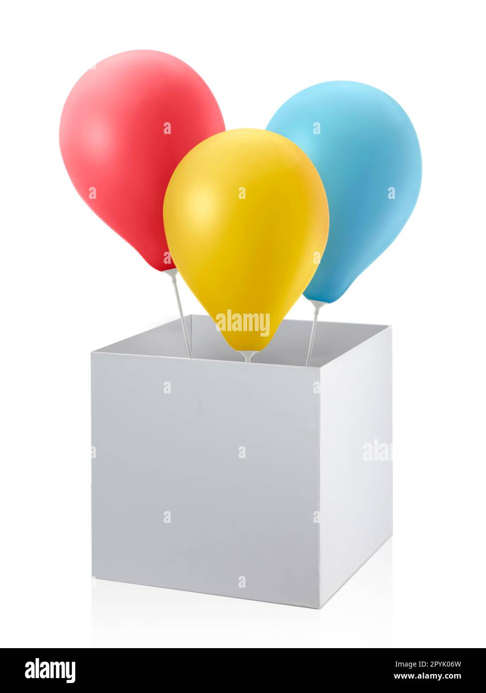 Balloon flying out of magic little box Stock Photo - Alamy