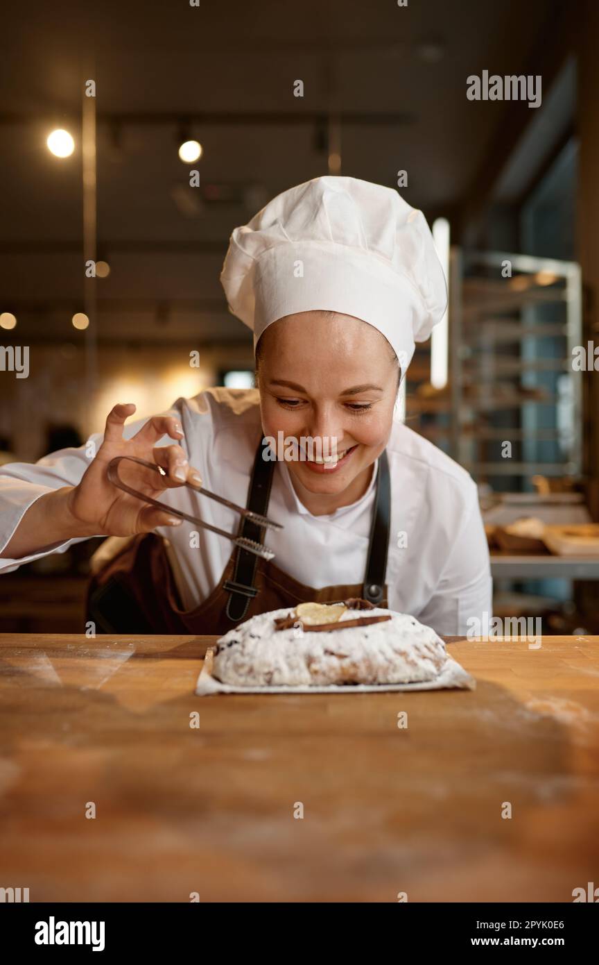 Female chef decorating tasty hi-res stock photography and images - Alamy