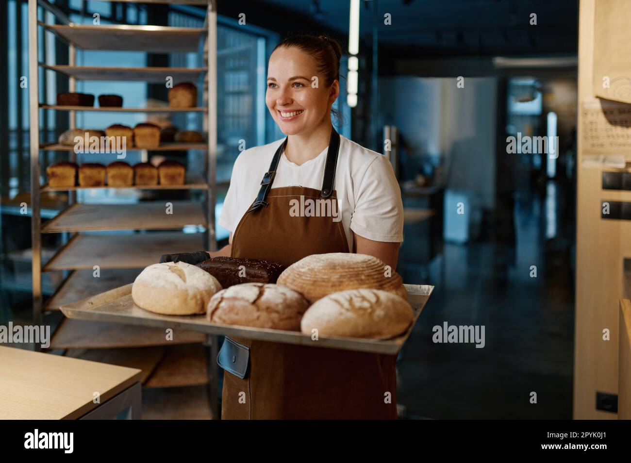 Woman baked bread kitchen hi-res stock photography and images - Alamy