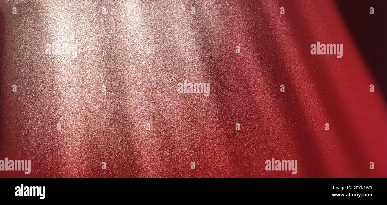 blurred striped red background. Play of light and shadow. Light rays ...