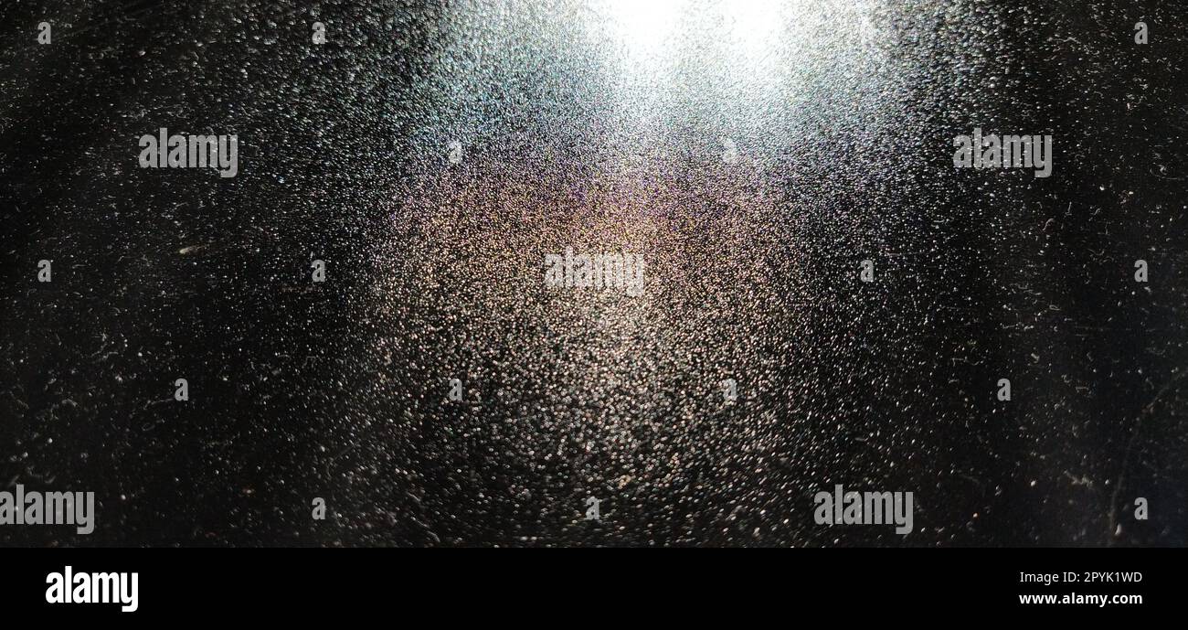 Light beam on black background with sparkles, radiance and sparkles ...