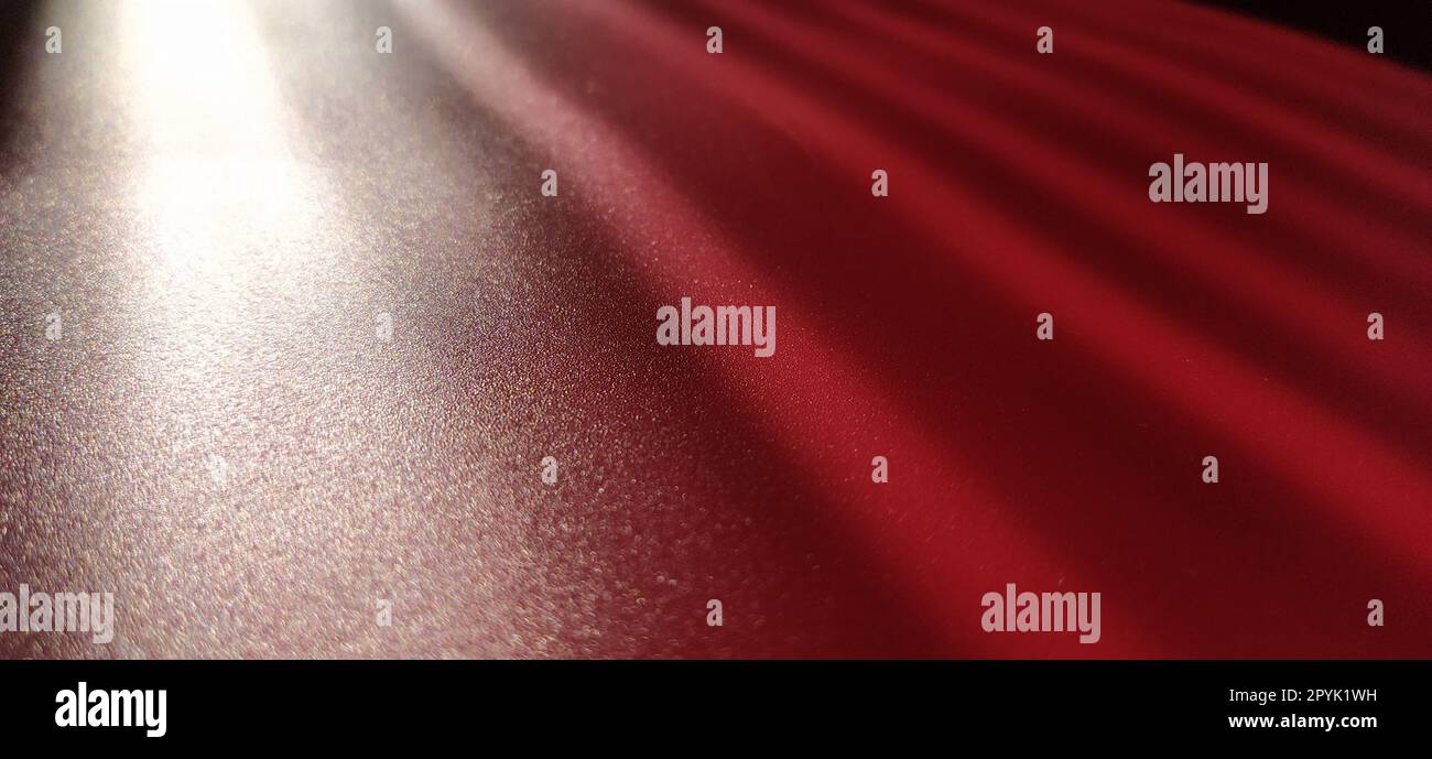 blurred striped red background. Play of light and shadow. Light rays ...