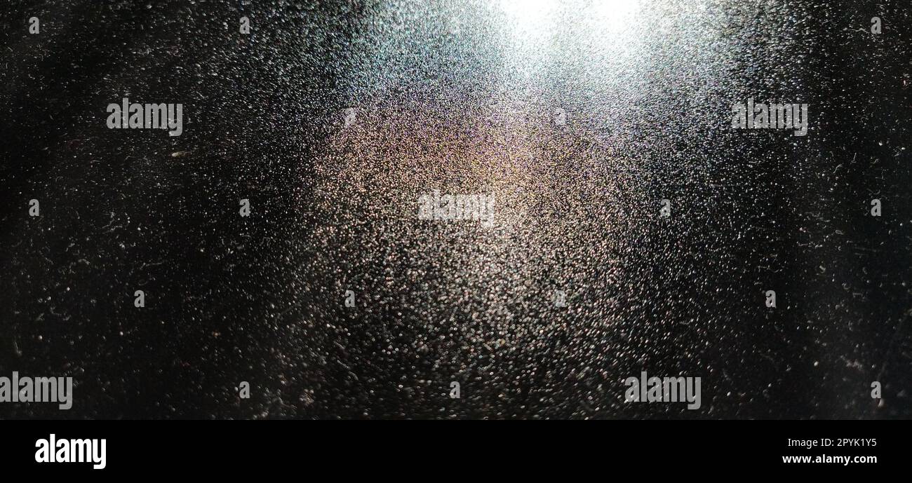 Light beam on black background with sparkles, radiance and sparkles ...
