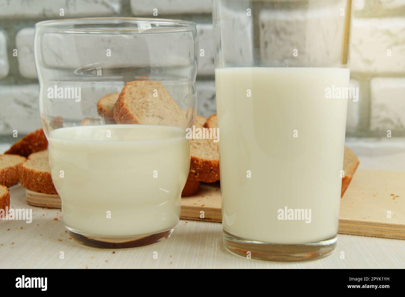 Two glasses of milk are on the table, Breakfast for the family, healthy ...