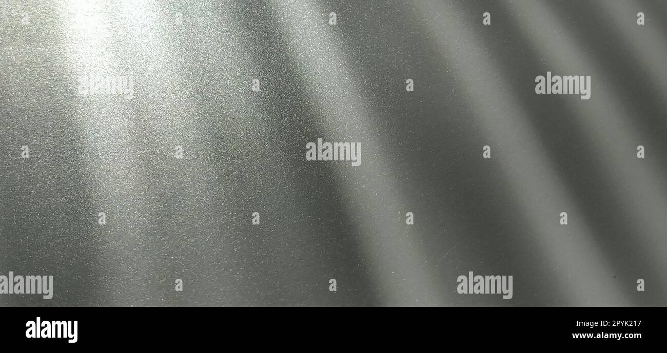 Gray striped background with oblique light effect. Play of light and ...