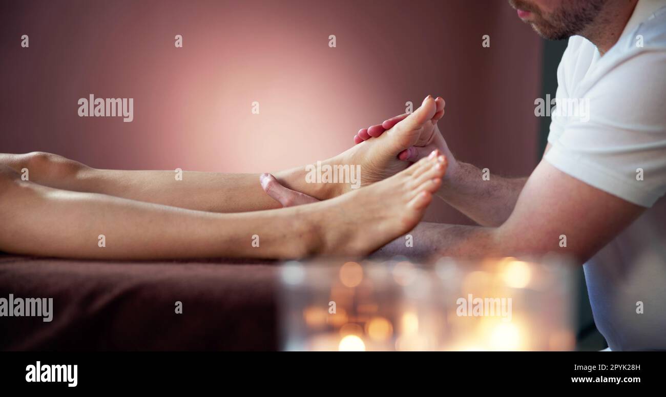 Reflexology Feet Massage Treatment Stock Photo - Alamy