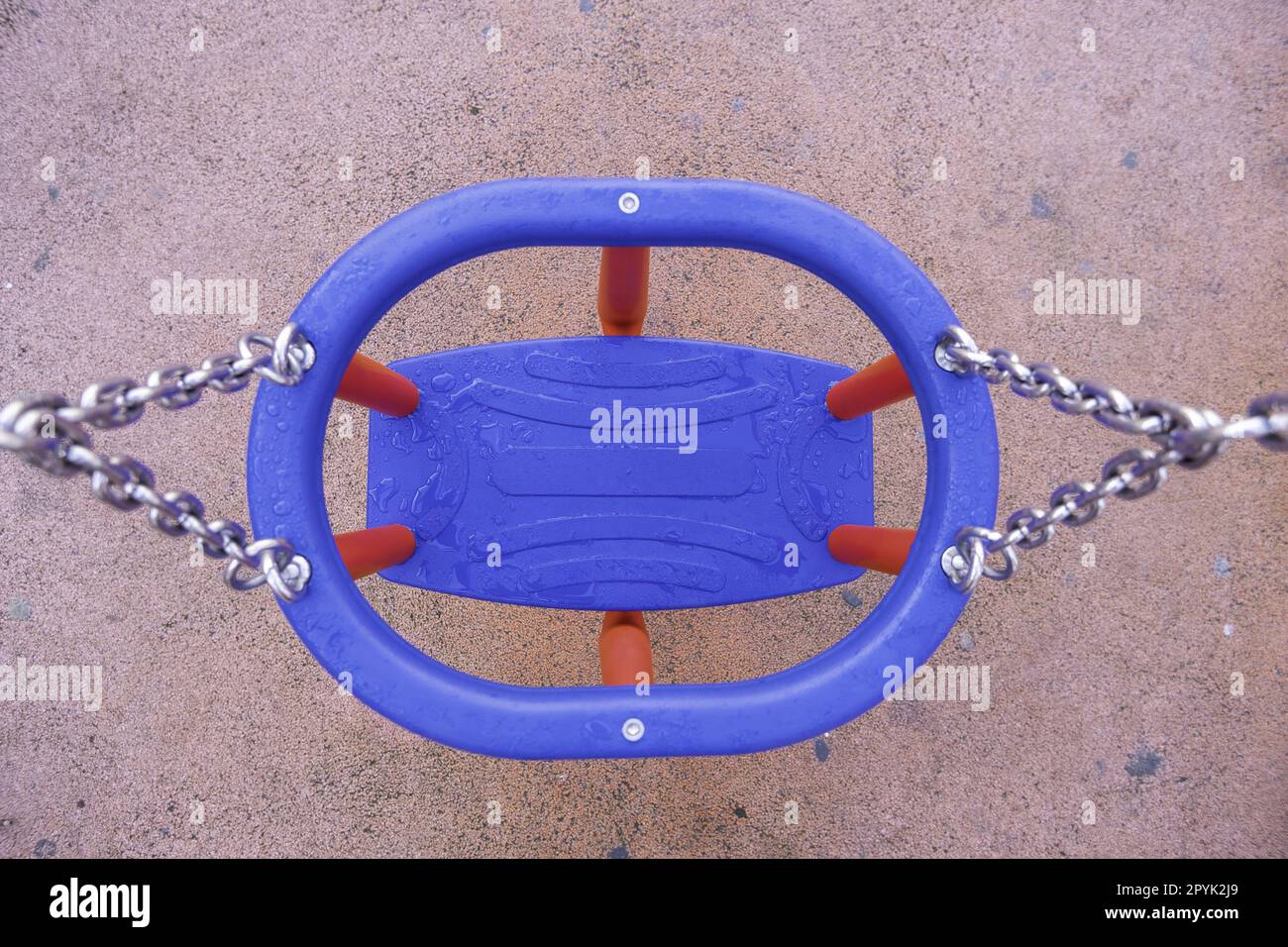 Swings in a playground Stock Photo - Alamy