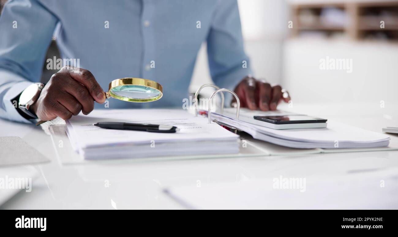 Fraud Investigation And Tax Audit. Investigator Or Auditor Stock Photo ...