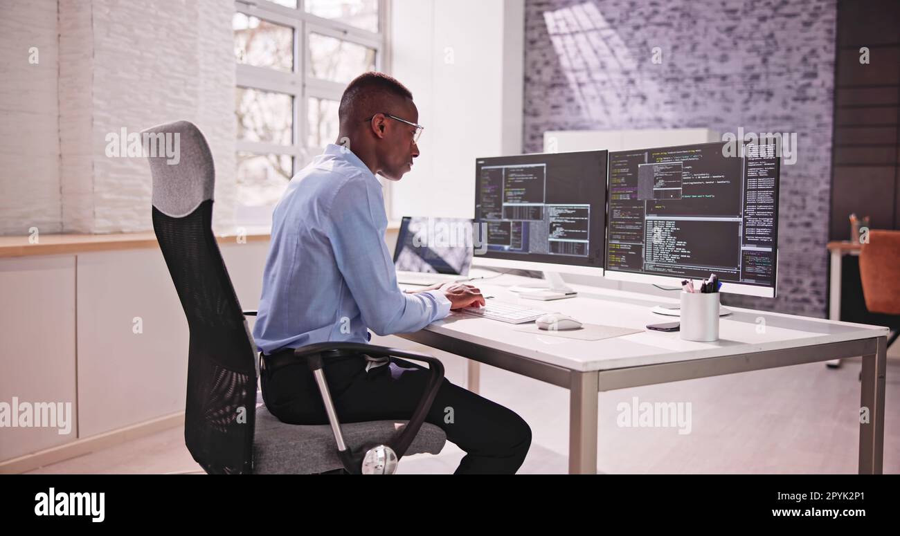African American Man Programmer. Girl Coding Stock Photo - Alamy