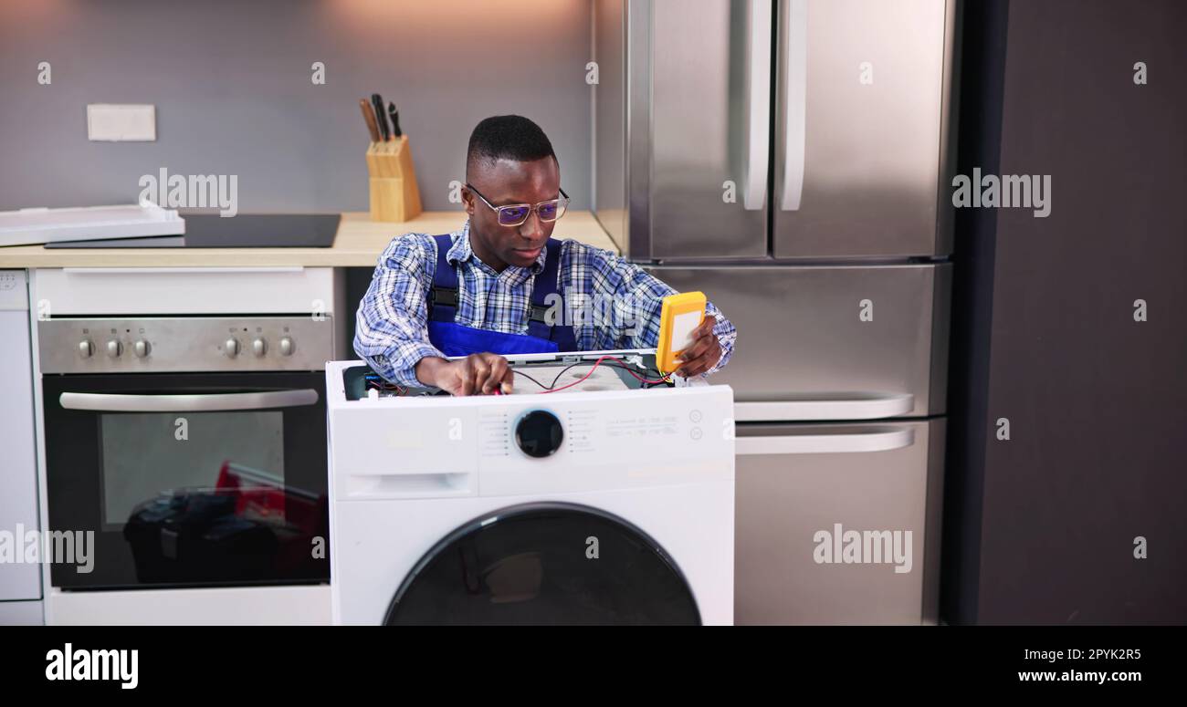 Washing Machine Appliance Repair And Install Stock Photo - Alamy