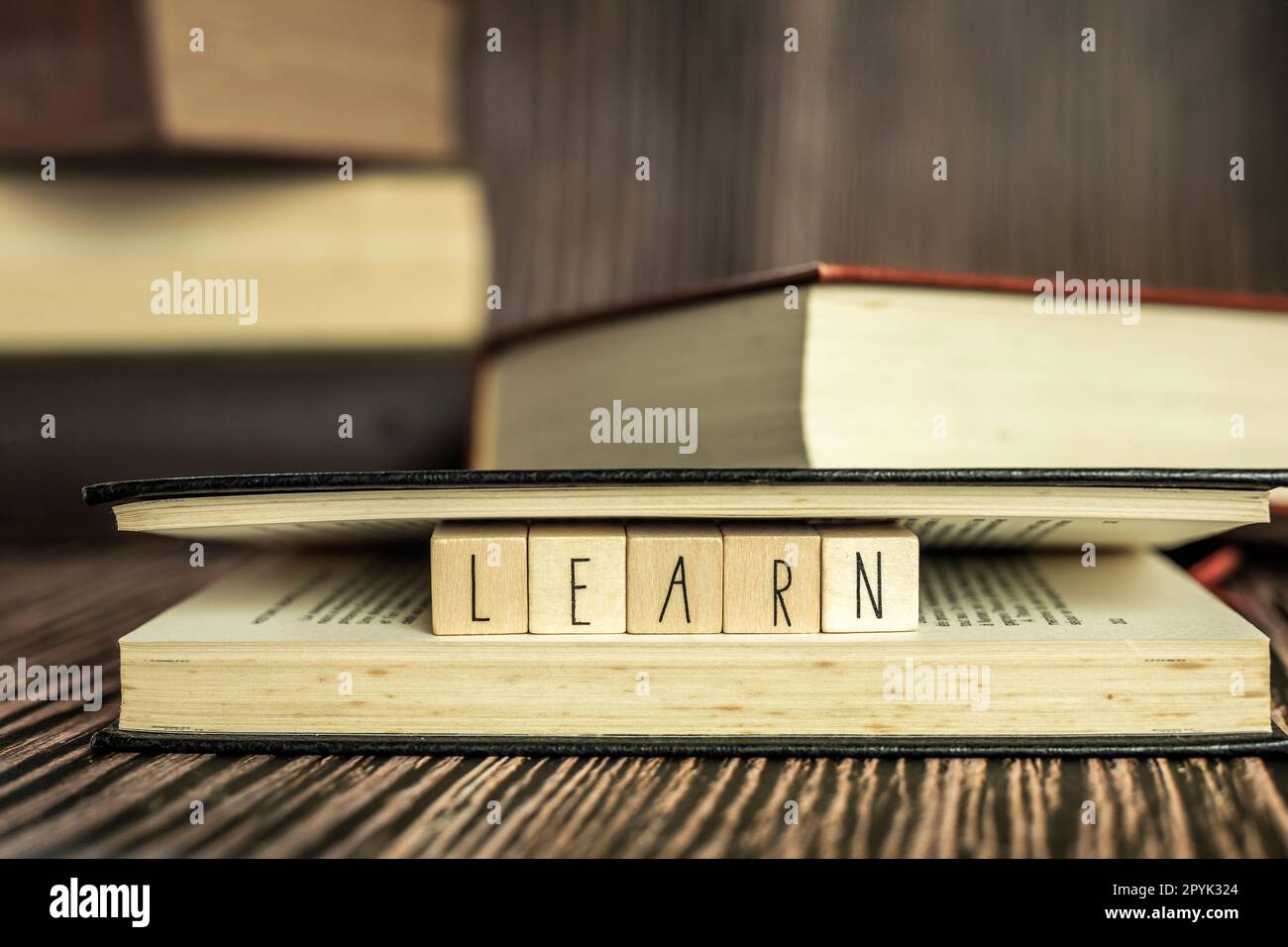 Pile of books, reading. Stack of books in the colored cover lay on the ...