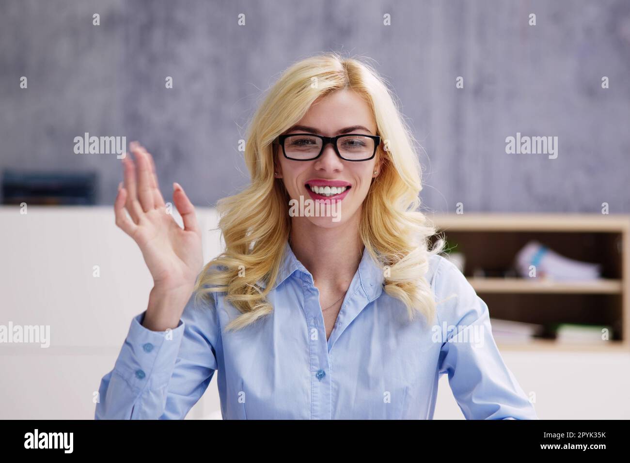 Waving hello hi-res stock photography and images - Alamy