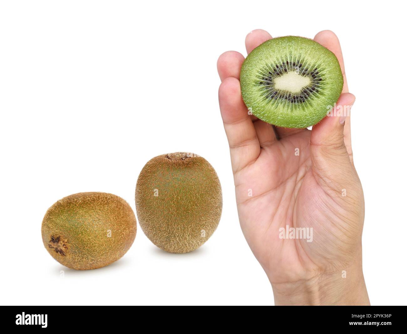 Hand holds sliced half of kiwi fruit isolated on white background Stock ...