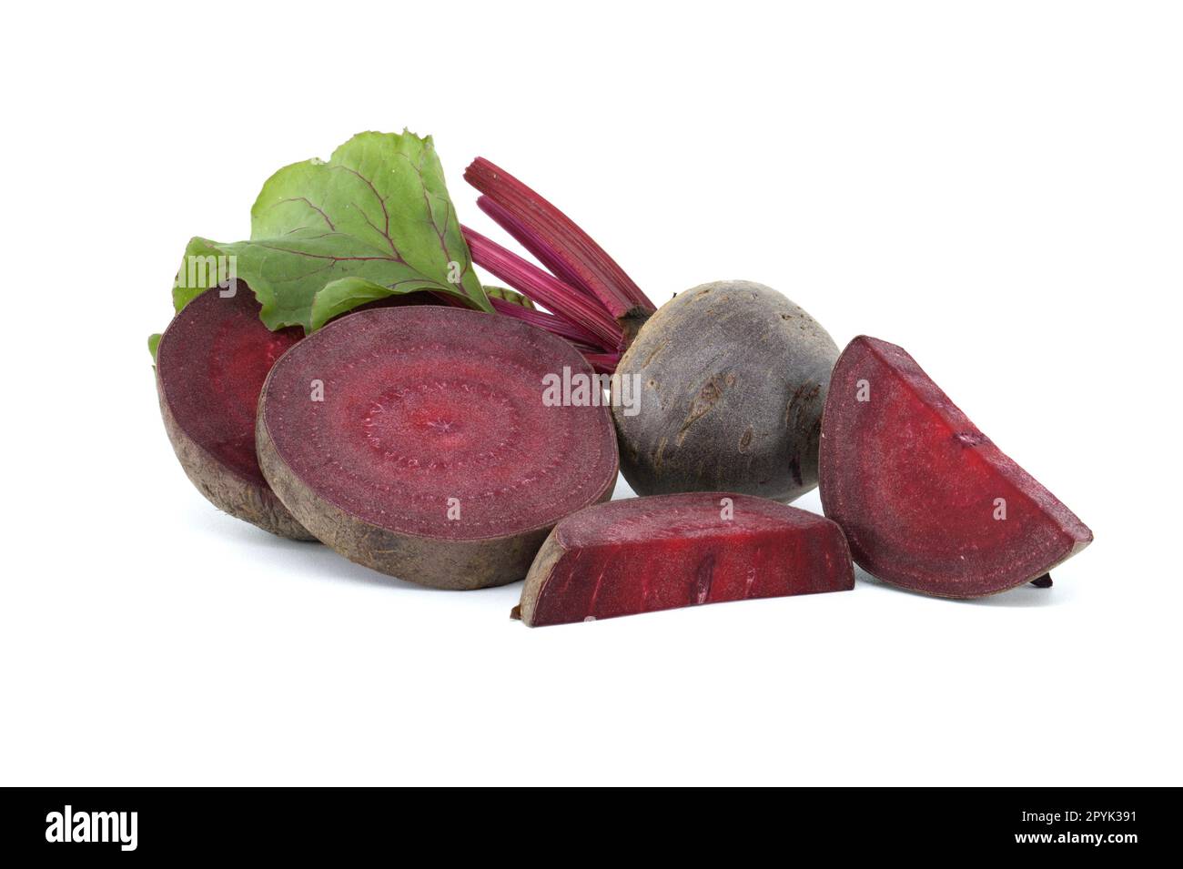 Raw sliced beetroot over white background Stock Photo - Alamy