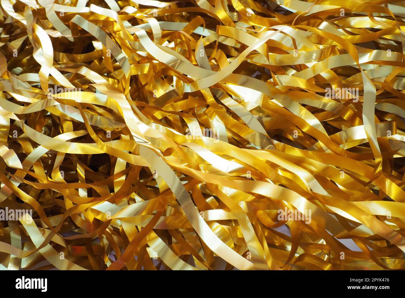 Tinsel-rain of golden color. New Year and Christmas decorations for the ...