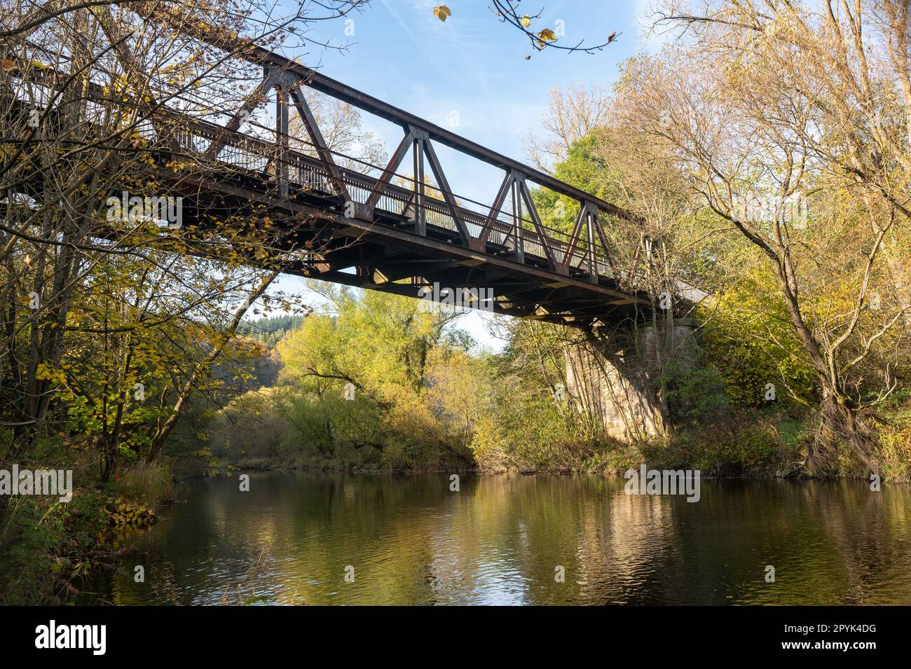 Iron bridge over a river in nature Stock Photo - Alamy