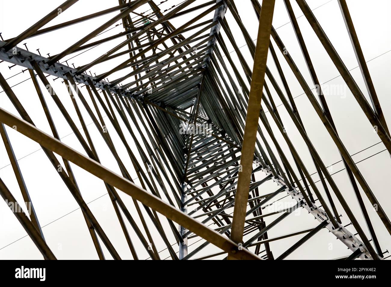 The metal structure of the frame of a high-voltage tower, view from the ...