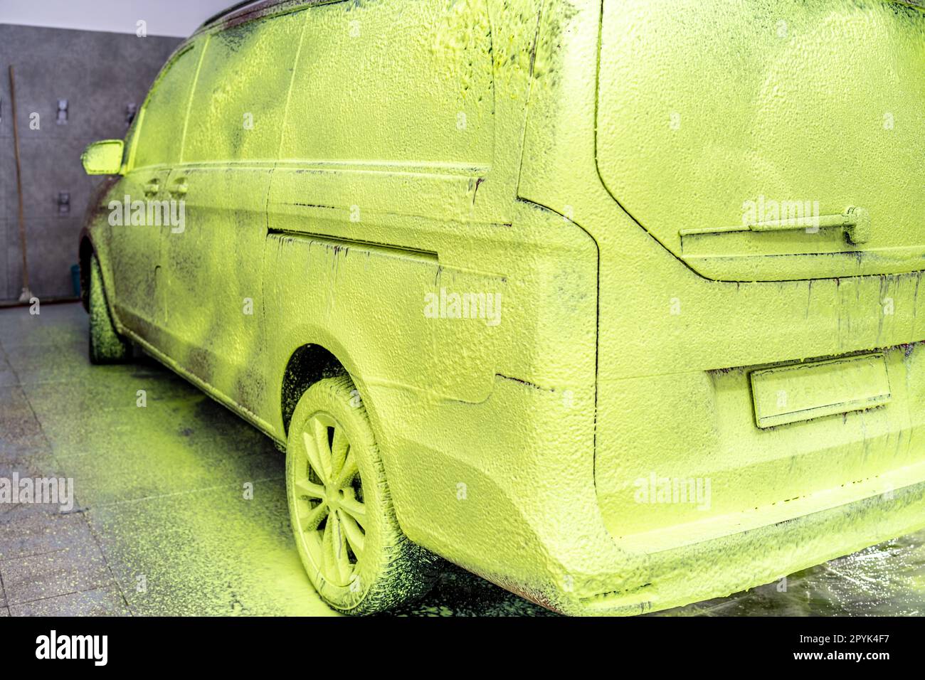 wash cars with green active foam in the garage Stock Photo - Alamy