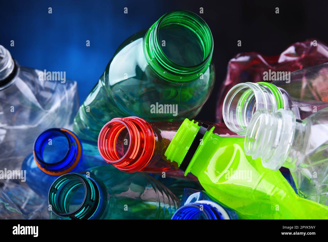 Empty colored carbonated drink bottles. Plastic waste Stock Photo - Alamy