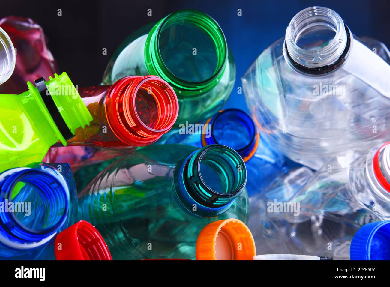 Empty colored carbonated drink bottles. Plastic waste Stock Photo - Alamy