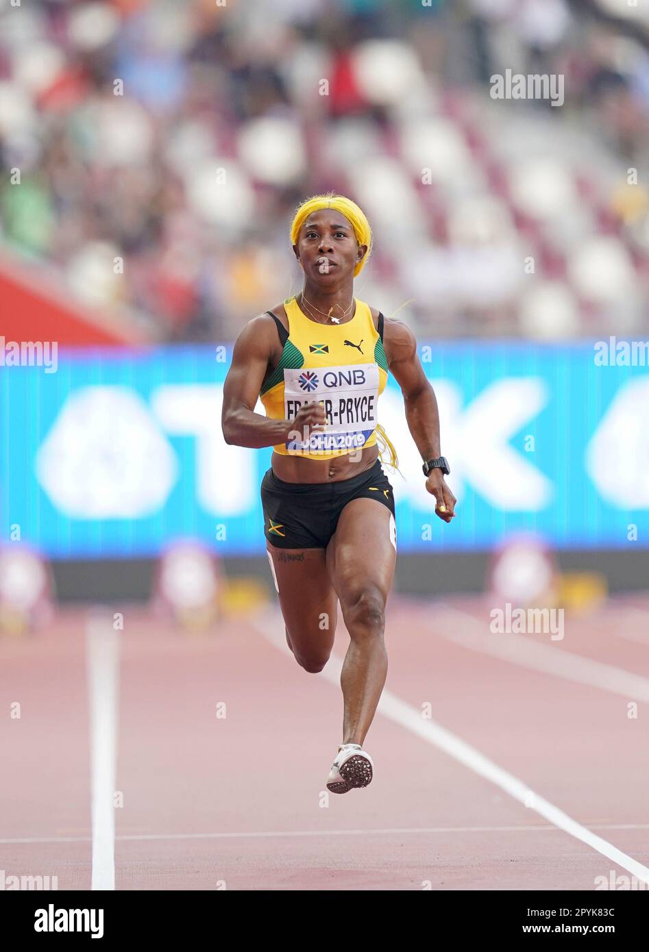 Shelly-Ann Fraser-Pryce running the 100m at the 2019 World Athletics ...