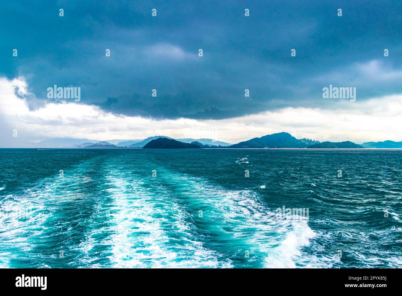 Travel Thailand by ferry boat yacht waves through tropical landscape ...