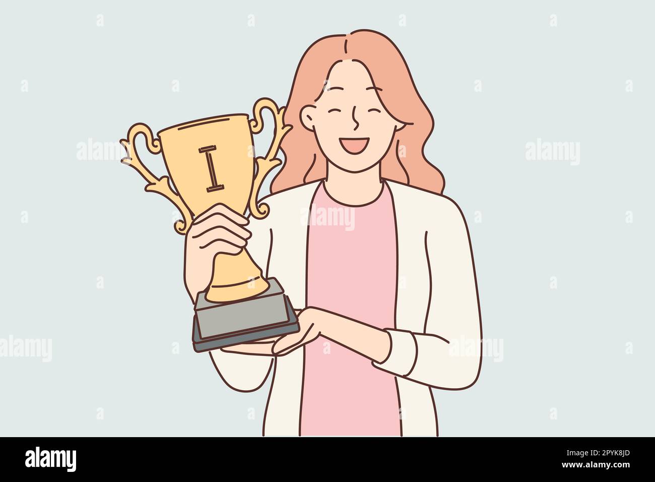 Happy woman with trophy cup in hands smiles and looks at screen showing ...