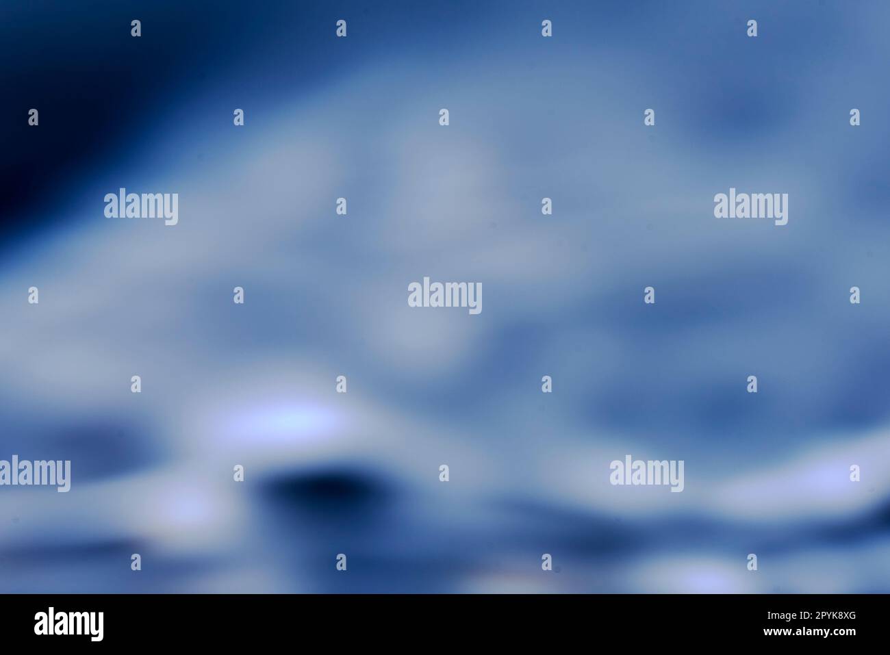 An abstract background of undefined shapes with various shades and ...