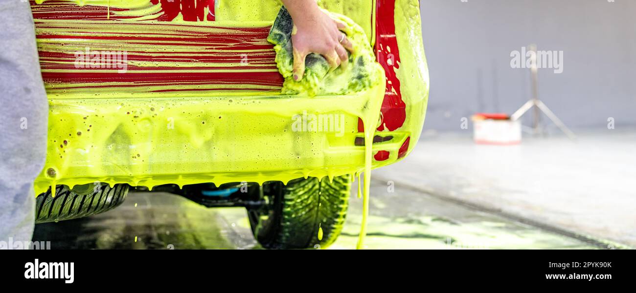 wash cars with green active foam in the garage Stock Photo - Alamy