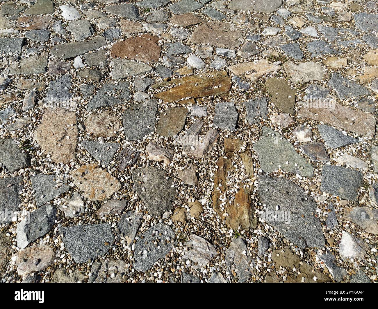 Uneven paving slab hi-res stock photography and images - Alamy