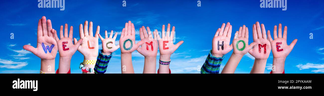 Children Hands Building Word Welcome Home, Blue Sky Stock Photo - Alamy