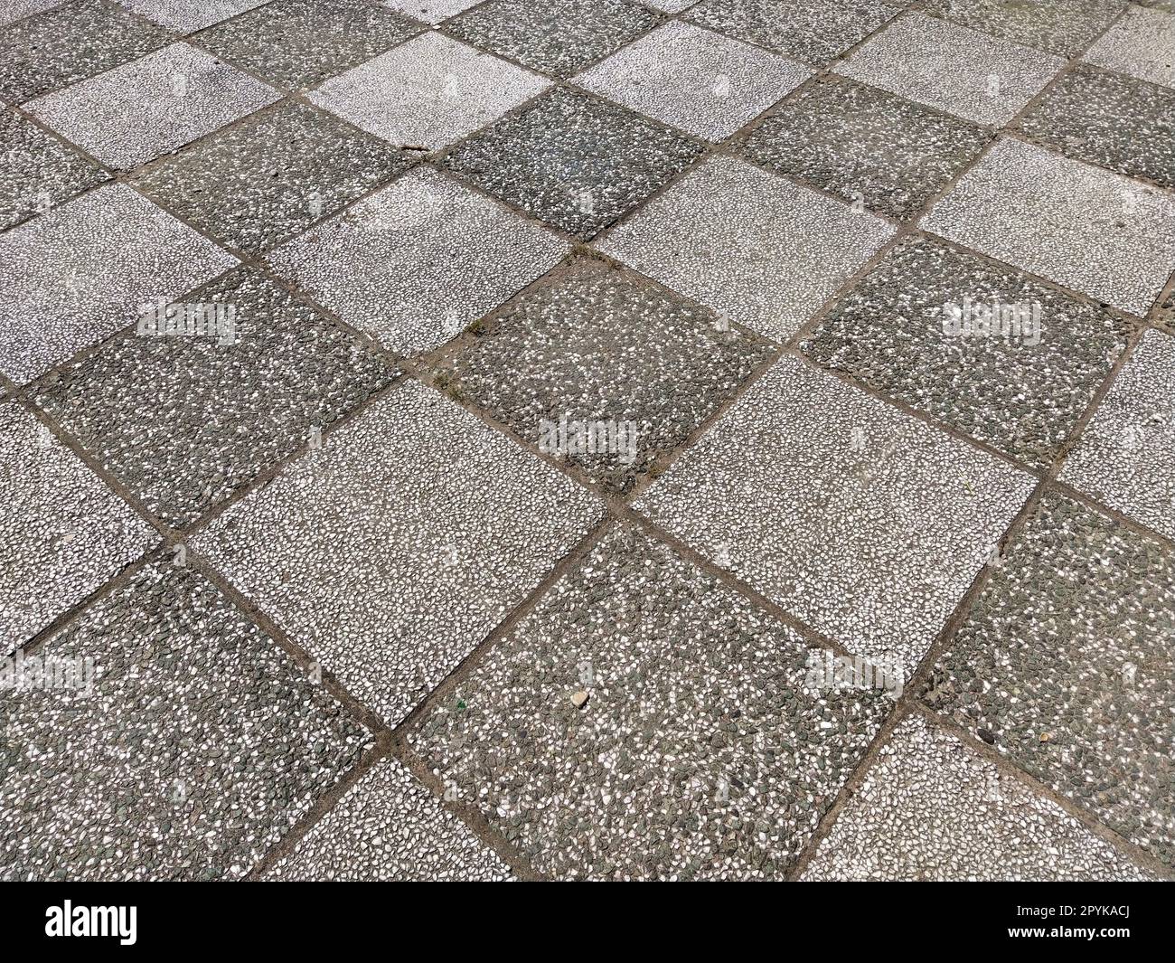 Chess tile. Monochrome asphalt markings on the sports field. Stone ...