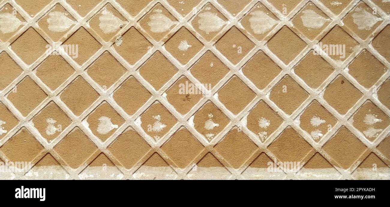 Reverse side of ceramic tiles. Detailed texture of tiles. Lattice ...