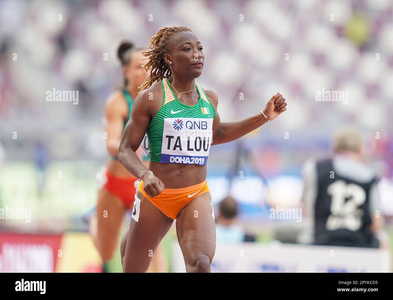 Marie-Josée Ta Lou running the 100m at the 2019 World Athletics ...