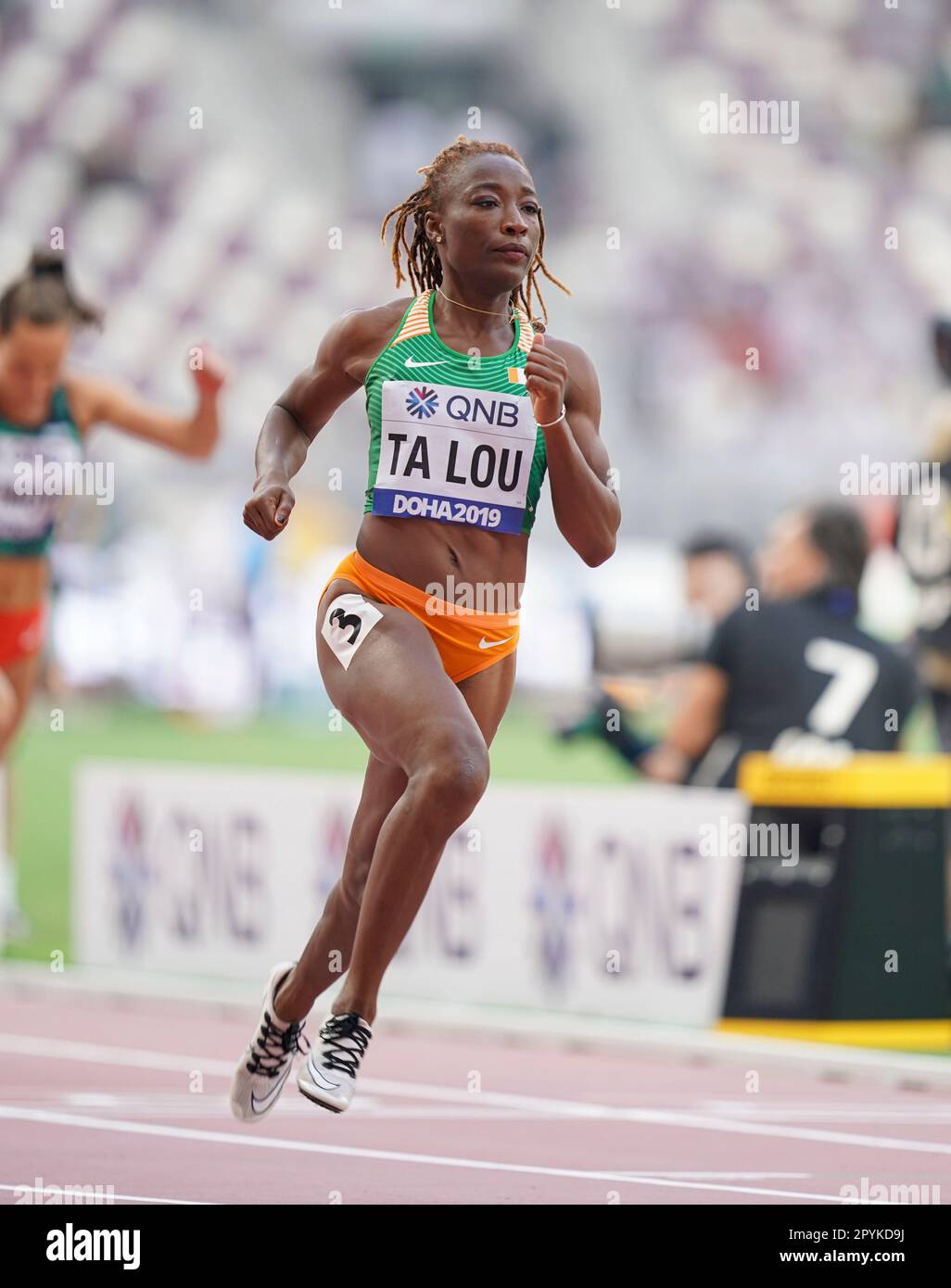 Marie-Josée Ta Lou running the 100m at the 2019 World Athletics ...