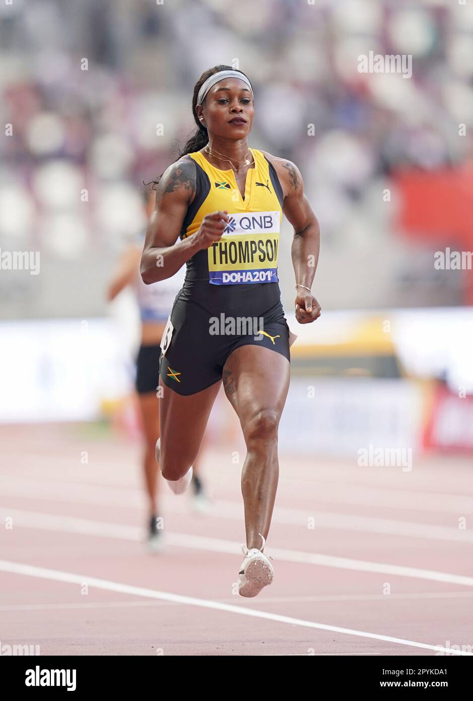 Elaine Thompson-Herah running the 100m at the 2019 World Athletics ...