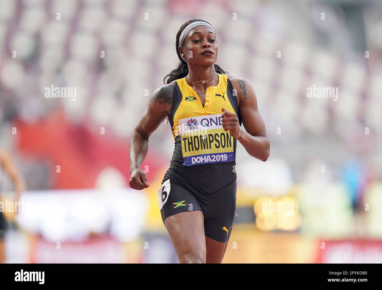 Elaine Thompson-Herah running the 100m at the 2019 World Athletics ...