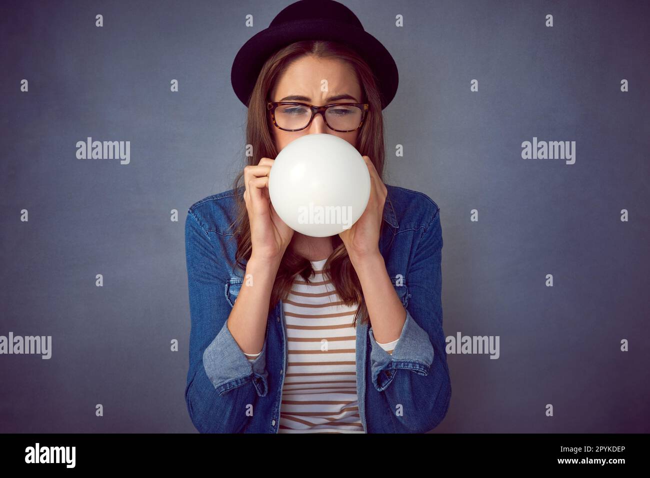 Beautiful woman in glasses blowing hi-res stock photography and images ...